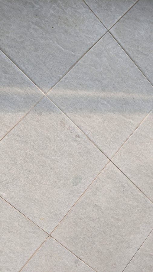 Diagonal Pattern of Light Grey Floor Tiles, Some with Subtle ...