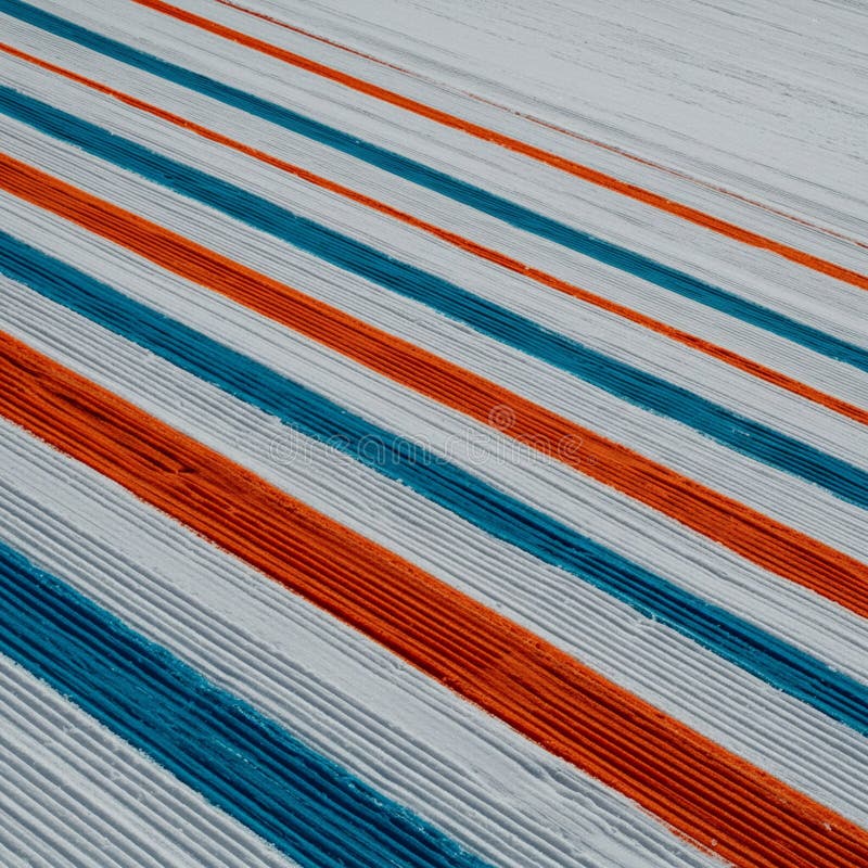 Diagonal Stripes in Blue, Orange, and White Create a Bold, Geometric ...