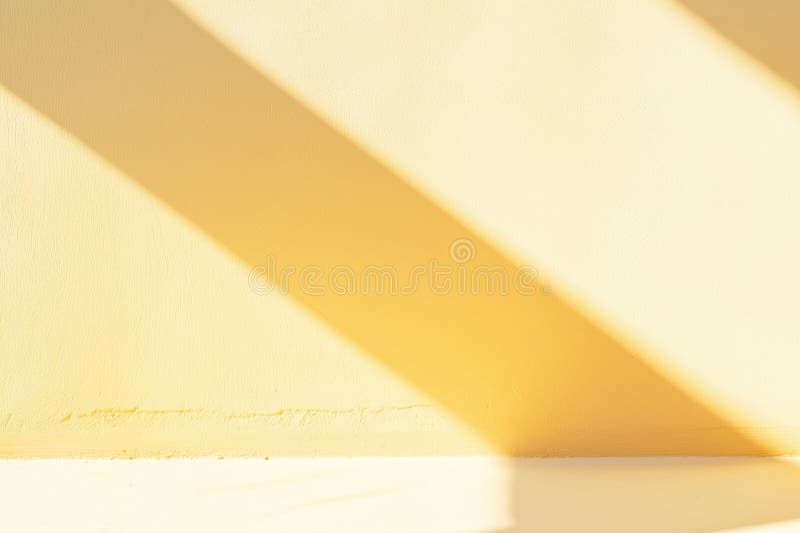 Diagonal Sunlight Creating Long Shadow on Yellow Wall Stock Image ...