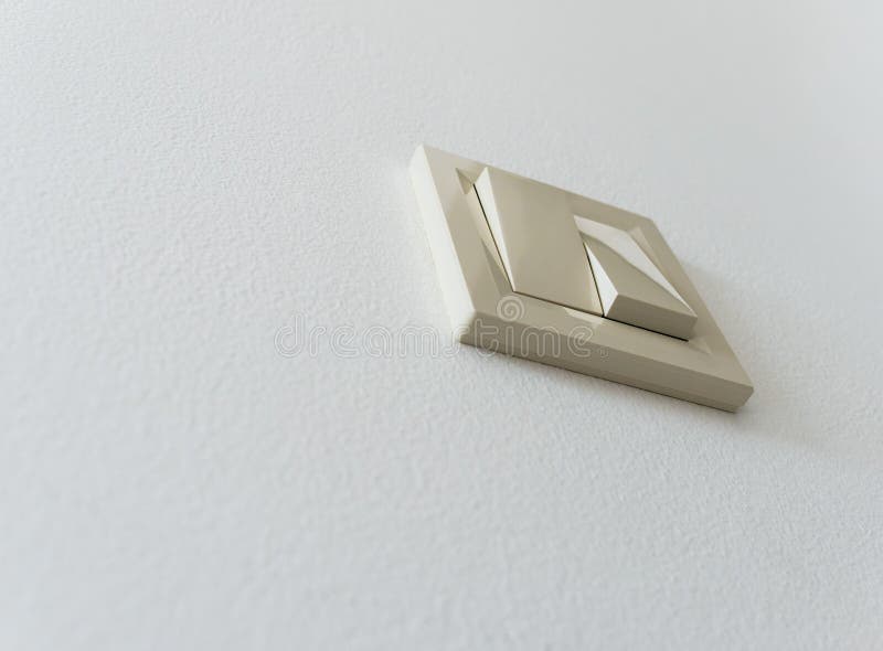 Diagonal View of an Electrical Switch on a White Wall Stock Photo ...