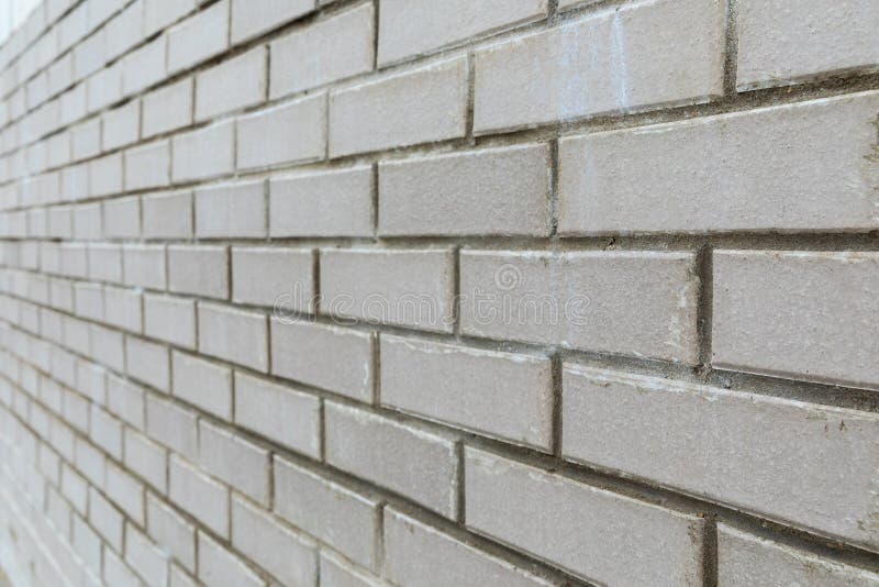 Diagonal View of White Brick Wall on Building Facade. Stock Photo ...