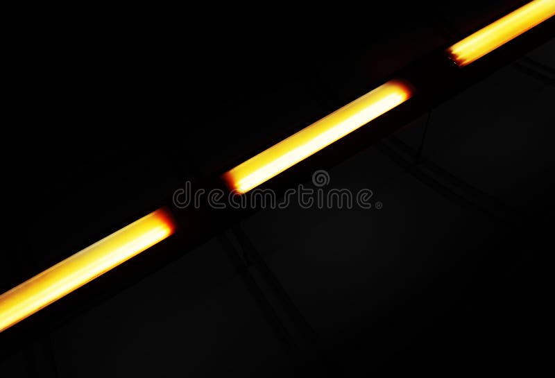 Diagonal Yellow Light Lamps Black Backdrop Stock Image - Image of ...