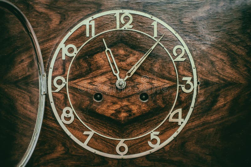 Dial of old wooden clock stock photo. Image of wooden - 143410746