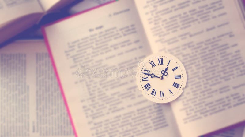 Dial with Roman Numerals on Books, Top View Stock Image - Image of book ...