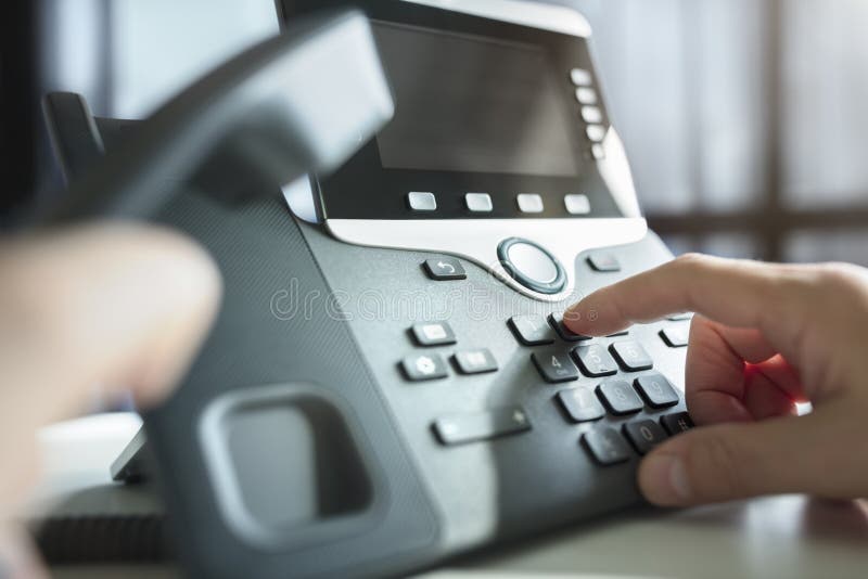 Dialing a Telephone in the Office Stock Image - Image of black, keypad ...