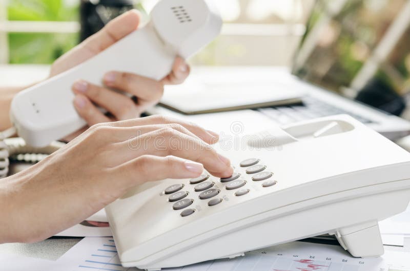 Dialling on a telephone stock image. Image of interior - 50992133