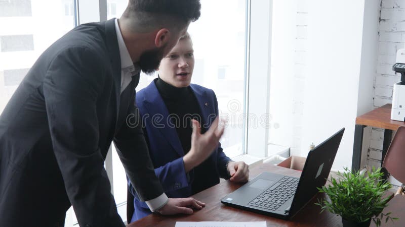 Dialogue of Two Men at Work, Young Businessmen in Suits Working and ...