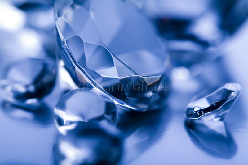 Diamond on blue background stock photo. Image of stone - 6304334