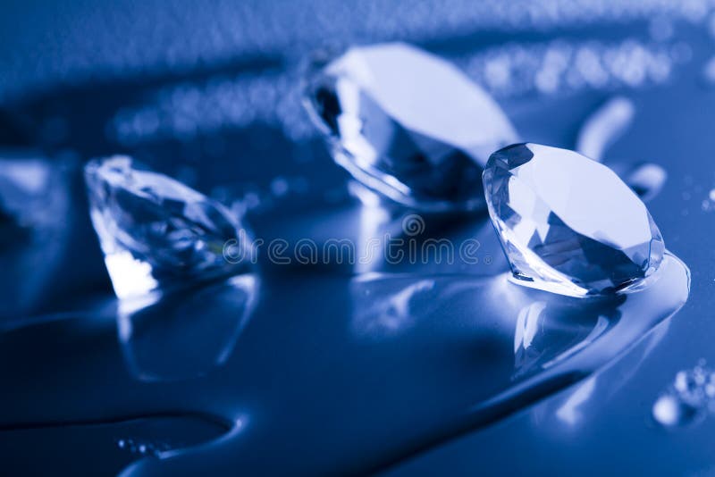 Diamond on blue background stock image. Image of gemstone - 6304357