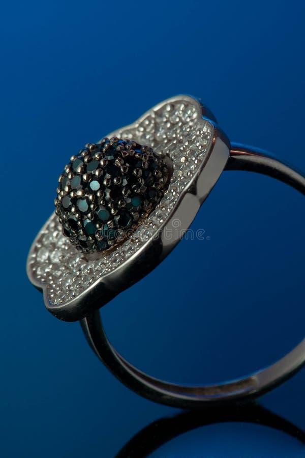 Diamond Ring on Blue Background Stock Photo - Image of woman, blue ...