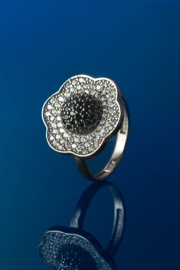 Diamond Ring on Blue Background Stock Image - Image of stones ...