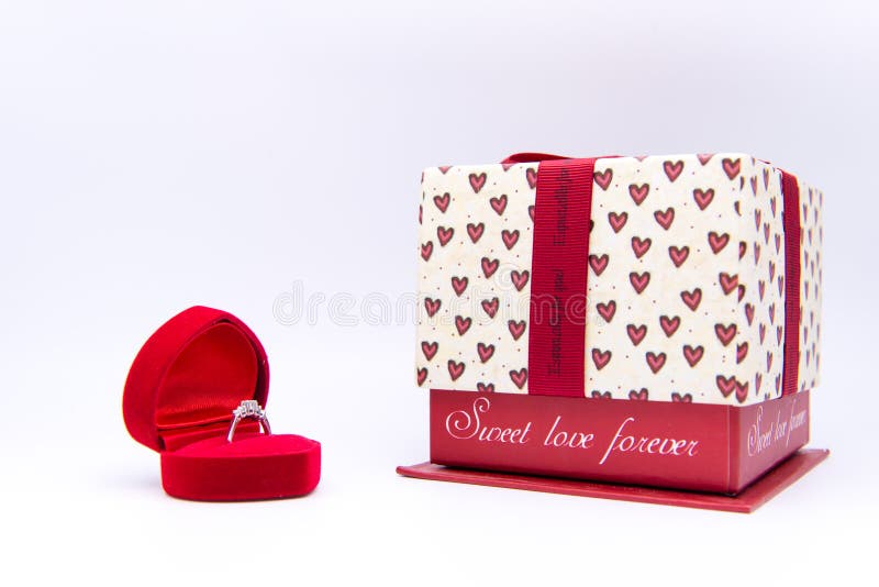 Diamond Ring in the Red Heart Box with Gift Box Isolated on Whit Stock ...