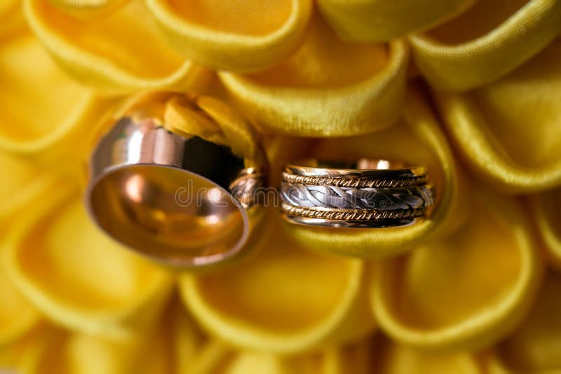 Diamond Ring on Yellow Flower. Wedding Rings Together Stock Image ...