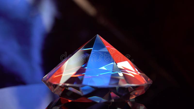 Diamond Rotating on a Surface and Flickering in Rays of Light Stock ...
