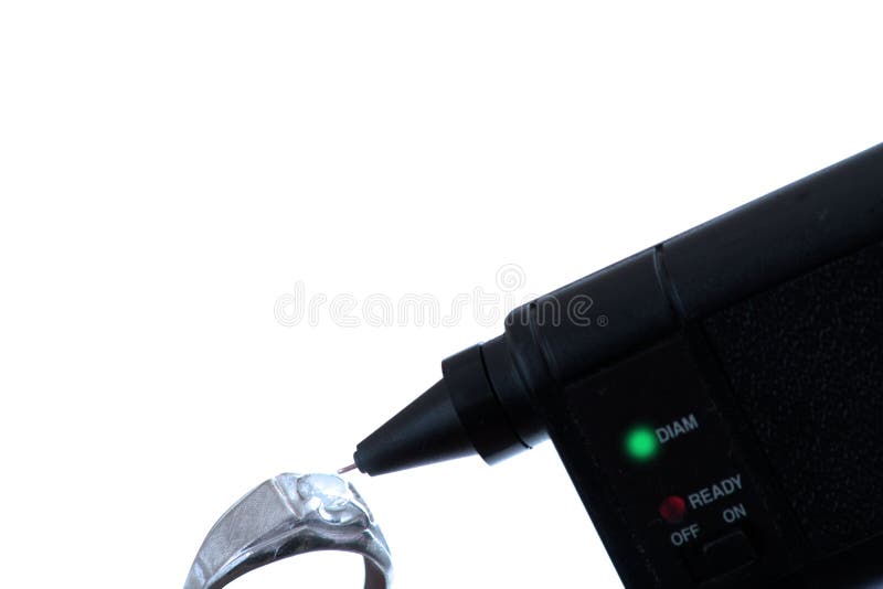 Diamond tester and ring stock photo. Image of test, green - 22598196