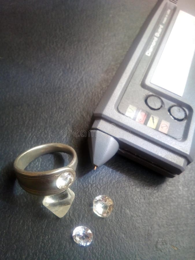 Diamond Tester with Ring and Stones Editorial Stock Photo - Image of ...