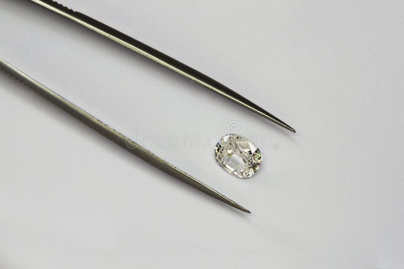 Diamond in Tweezers with Ring Stock Photo - Image of diamond, close ...