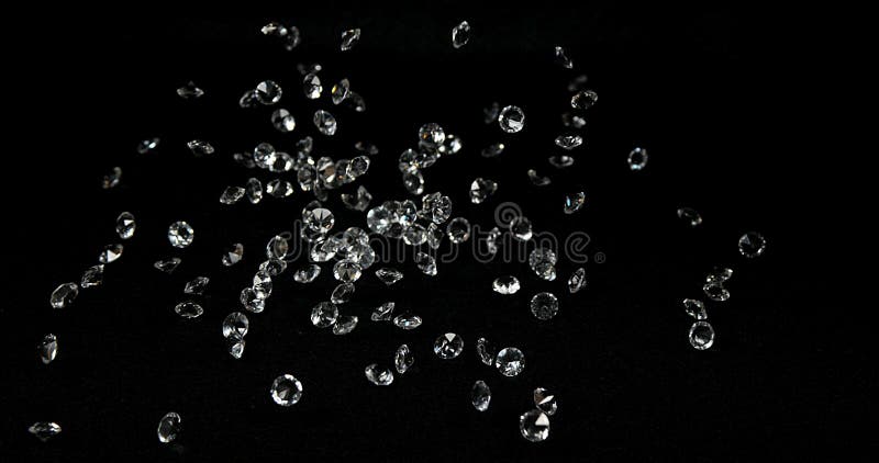 Diamonds Falling Against Black Background Stock Photo - Image of night ...