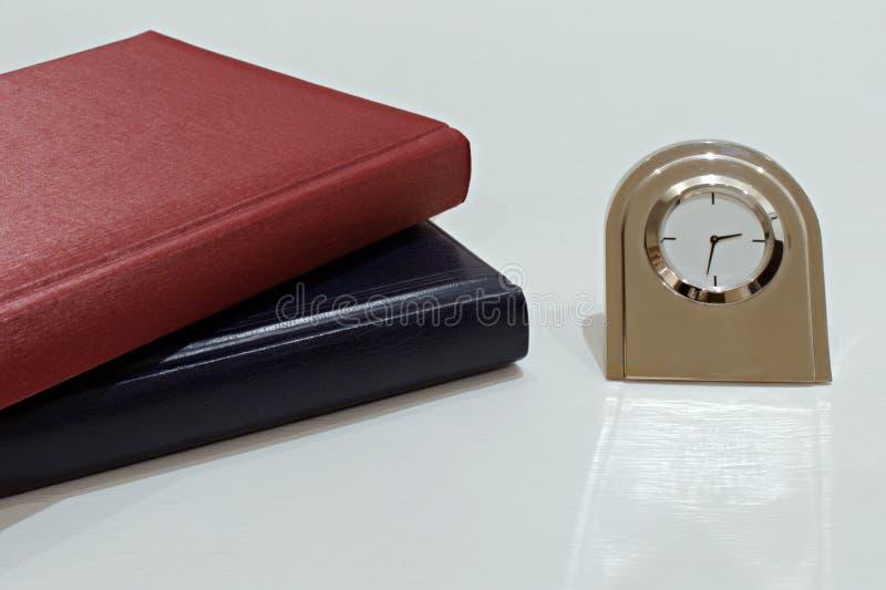 Diaries Organizers and Metal Table Clock Stock Image - Image of ...
