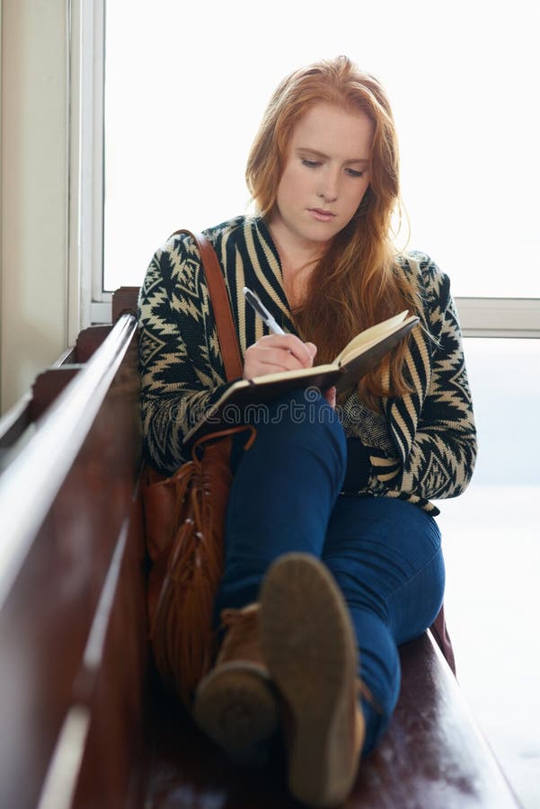 Diarising Some Notes. a University Student Writing in Her Notebook on ...