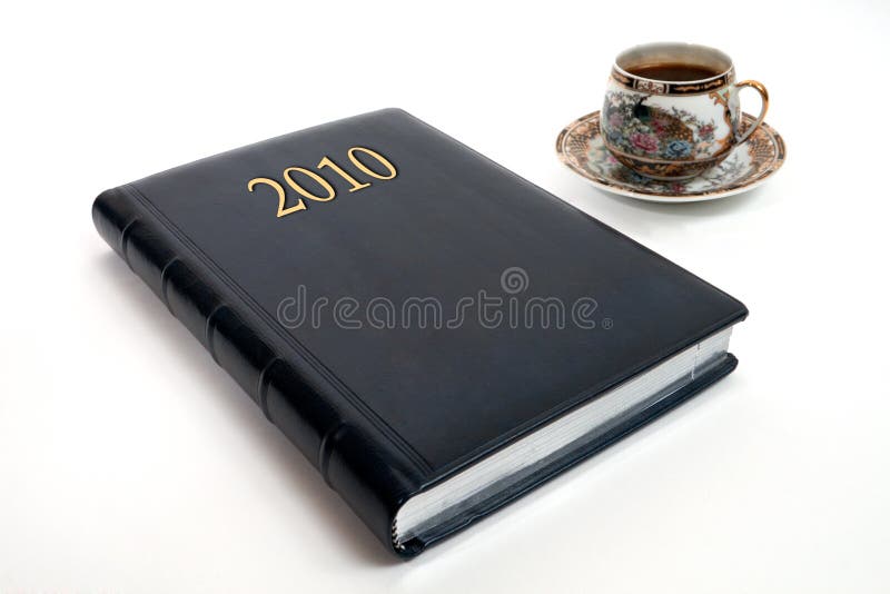 Diary and cup of coffee stock image. Image of ceramic - 12153039