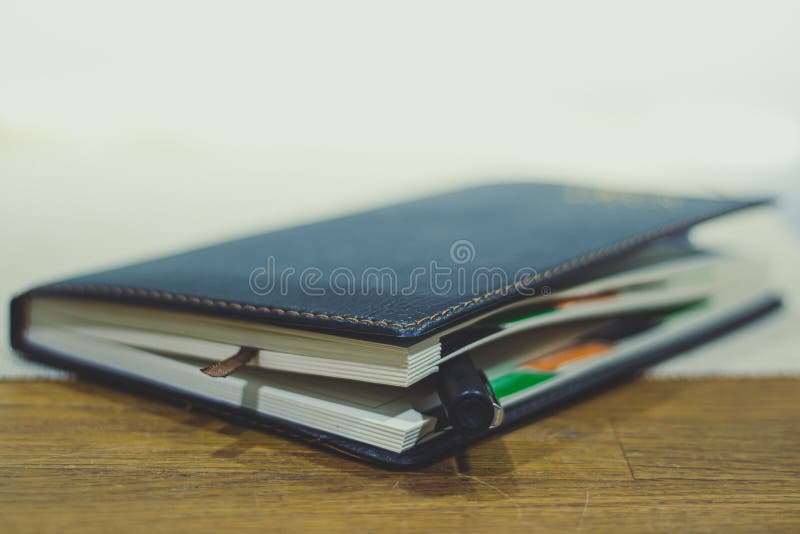 Diary with Fountain Pen Isolated on Wooden Table Stock Photo - Image of ...