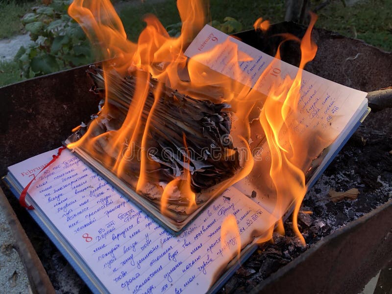 Diary with daily Hand Written Note Burning in Fire Flame Stock Photo ...
