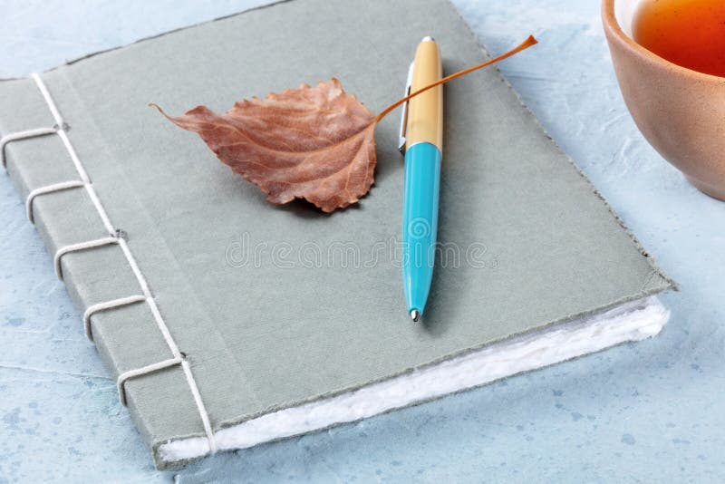 A Diary. a Handmade Journal with a Pen, an Autumn Leaf, and a Cup of ...