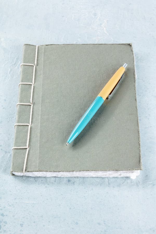 A Diary. a Paper Journal with a Pen on a Desk Stock Image - Image of ...