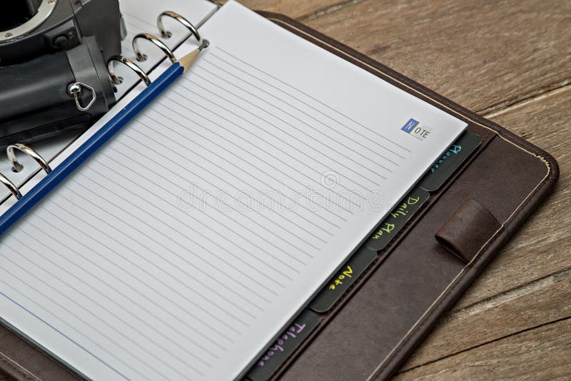 Diary with Retro Camera stock photo. Image of multitasking - 45288240