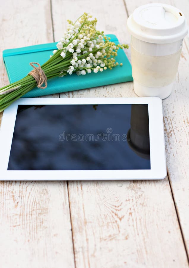 Diary, a Tablet Computerand Lilies of Valley Stock Photo - Image of ...
