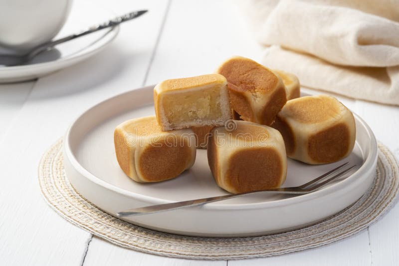 Chinese Cakes Dice Shaped Stuffed with Mung Bean in White Plate Stock ...
