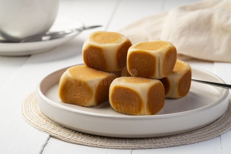 Chinese Cakes Dice Shaped Stuffed with Mung Bean in White Plate Stock ...