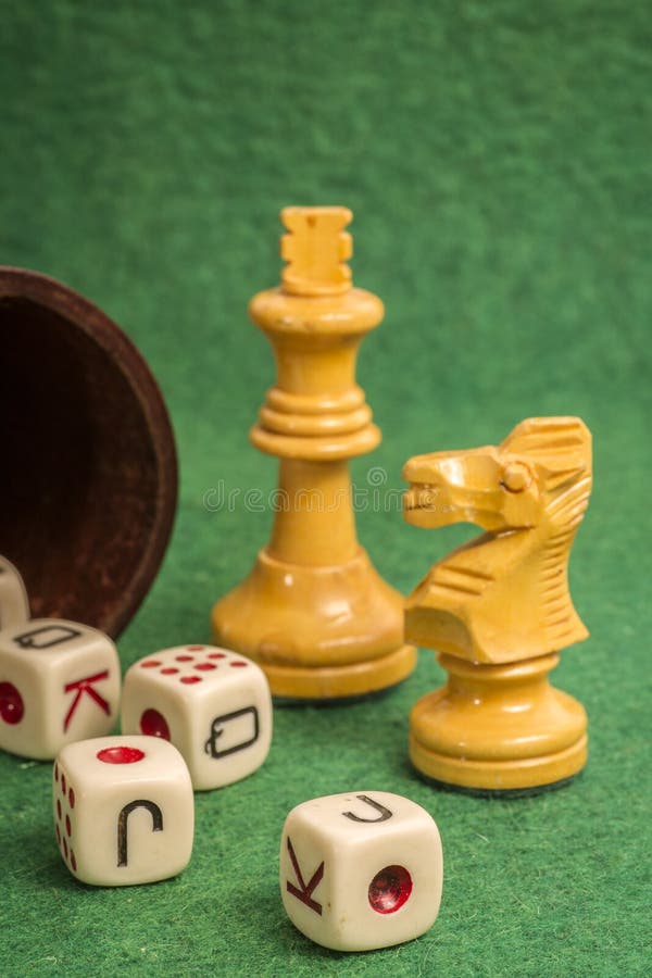 Dice Cup with Chess Pieces stock image. Image of chessmen - 44957945