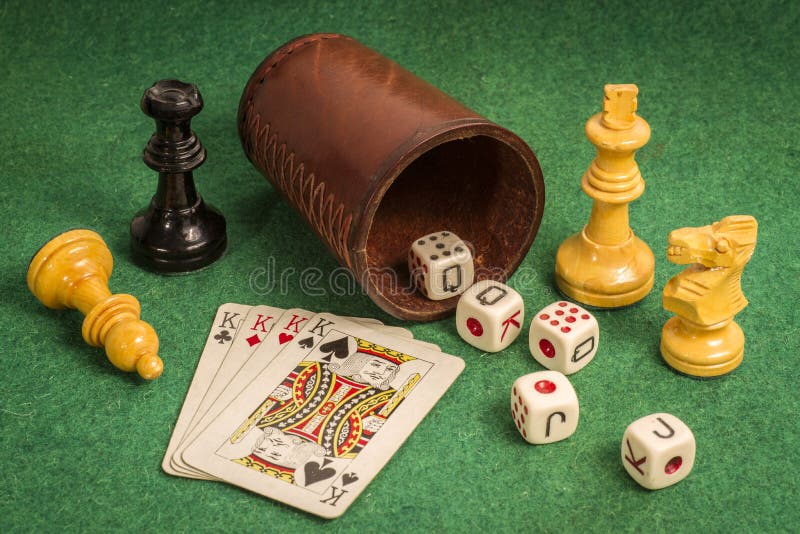Dice Cup with Deck Cards and Chess Pieces Stock Photo - Image of ...