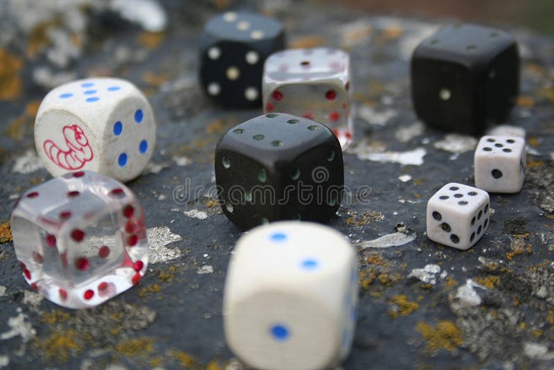 Game Dice of Different Types on a Stone Background Stock Photo - Image ...
