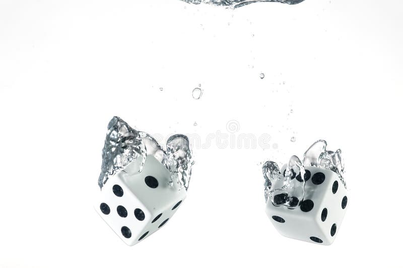 Dice Dropped into the Water, on a White Background. Stock Photo - Image ...