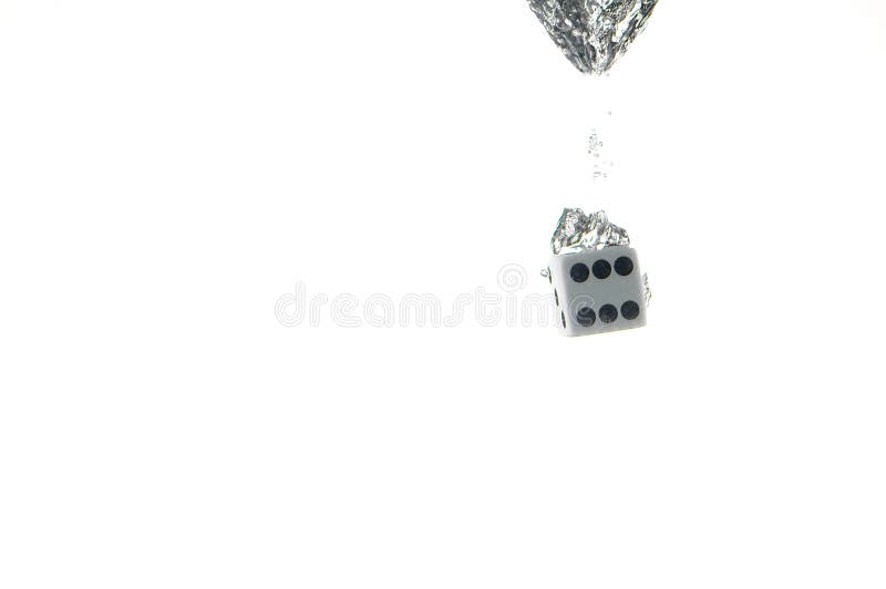 Dice Dropped into the Water, on a White Background. Stock Image - Image ...