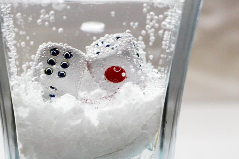Dice Dropped into the Water, on a White Background. Stock Image - Image ...