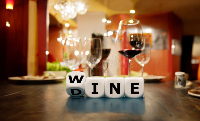 Dice Form the Words Wine and Dine in a Restaurant. Stock Image - Image ...