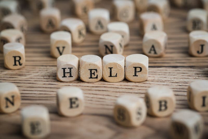 Dice forming the word HELP stock photo. Image of information - 98685470