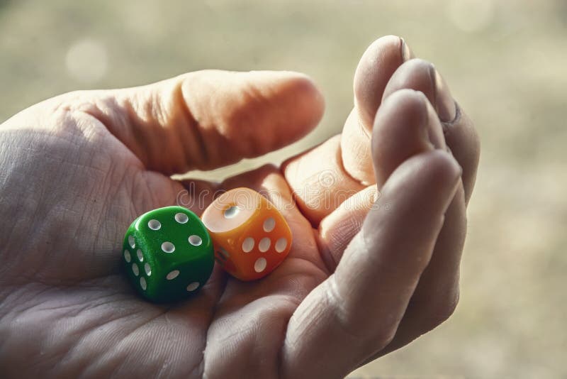 Dice in hand. Throw dice stock photo. Image of loss - 244898384