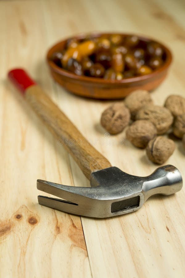Dice and Nuts on a Background of Pine Wood. Stock Image - Image of ...