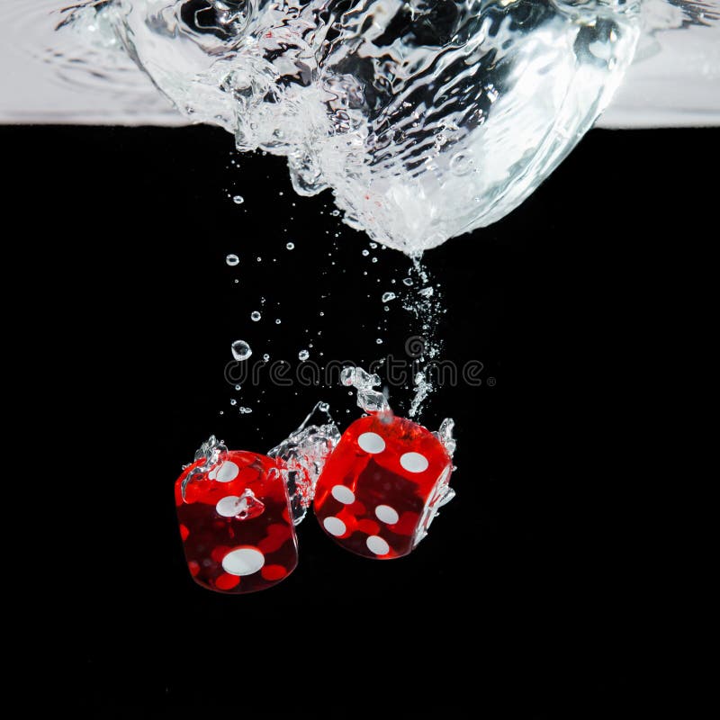 Dice playing in the water stock image. Image of leisure - 81610789