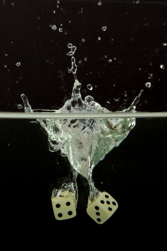 Dice with splashing water stock image. Image of basin - 26362107
