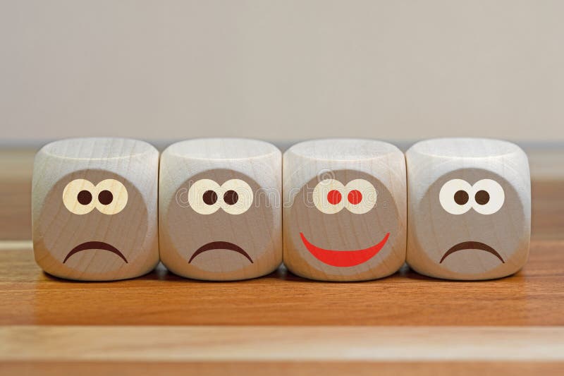 Dice with Three Negative and One Positive Facial Expression Stock Image ...