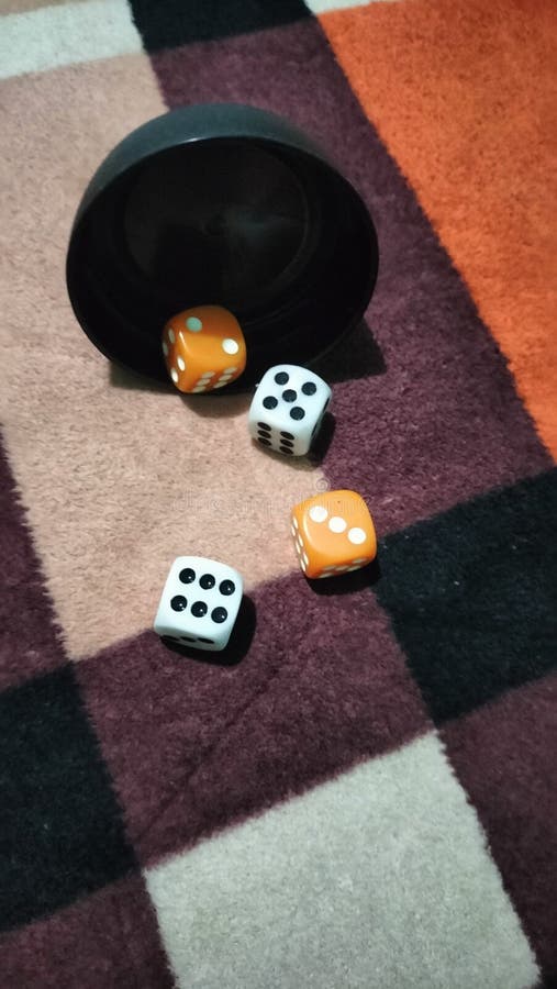 Dice throwing game for fun stock photo. Image of number - 310256100
