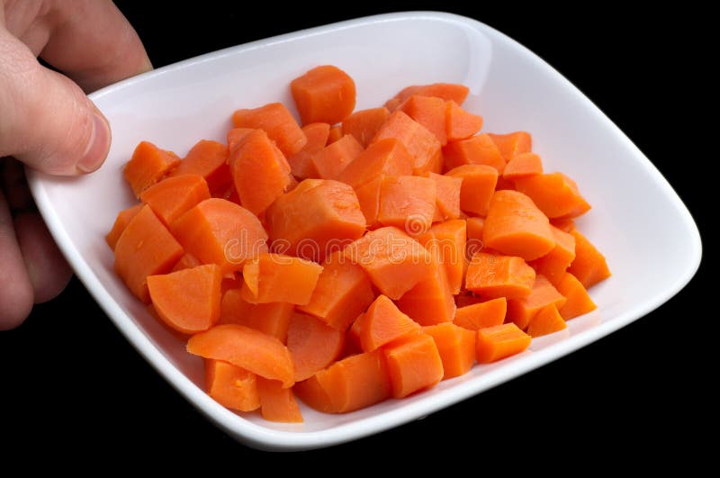 Diced carrot on the plate stock image. Image of fresh - 4399835