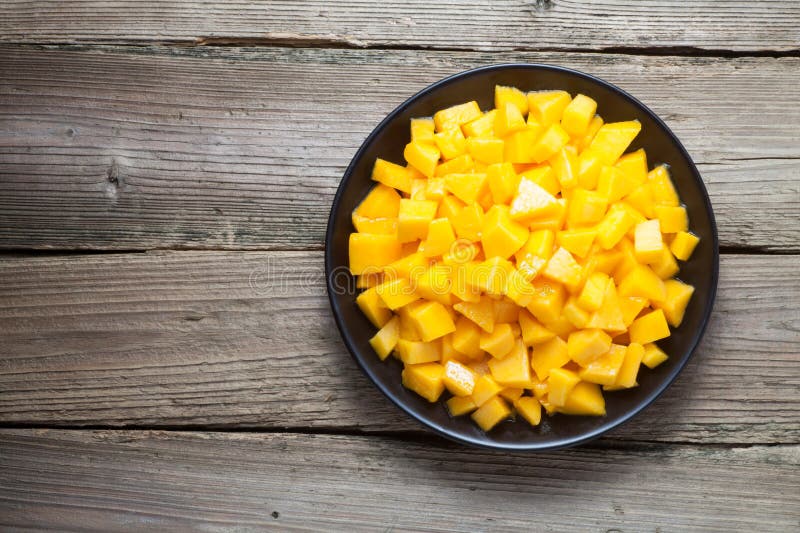 Diced Mango in a Black Plate Stock Photo - Image of view, sweet: 322992876