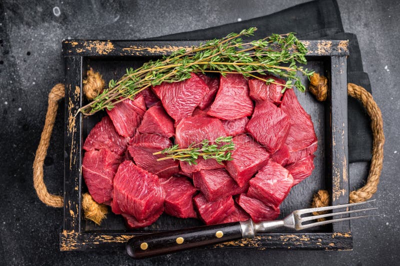 Diced Roe Deer Meat, Raw Venison Wild Game Meat. Black Background Stock ...